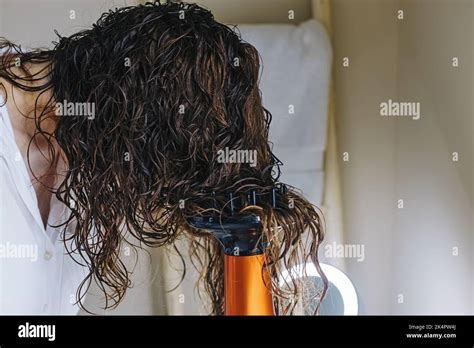 Woman Diffusing Her Hair With A Dryer Drying Hair According To A Curly Method For Hair Styling