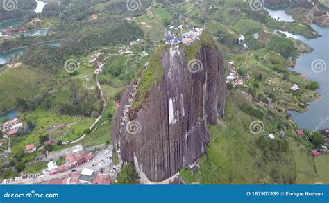 Aerial Lateral View Of Large Granite Rock Peck Of Guatape Stock Video