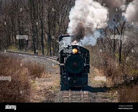 Head On And Above View Of An Approaching Restored Narrow Gauge