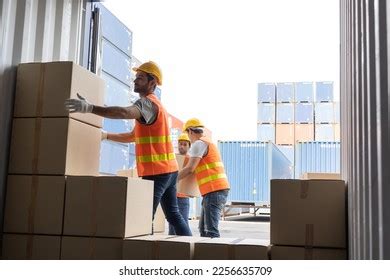Men Worker Loading Cardboard Boxes Into Stock Photo 2207164769 Shutterstock