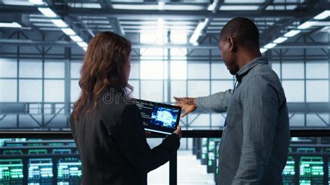 Data Center Technicians Deploying Ai Driven Management Tools Using Tablet Stock Video Video Of