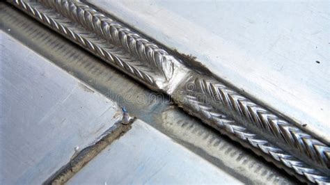 A Highresolution Image Showing A Crosssection Of A Welded Joint Under A