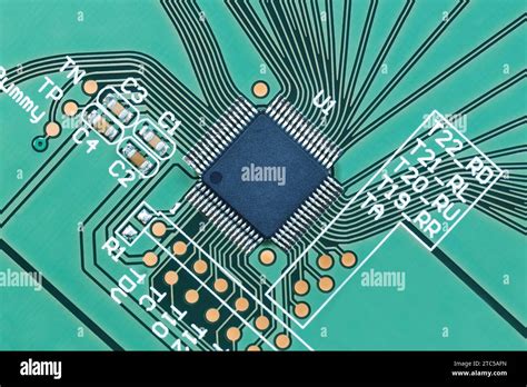 Microprocessor On A Green Printed Circuit Board Close Up Top View Macro Photography Stock