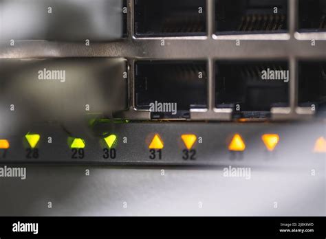 A Detail Shot Of A Networking Switch With Plugged In Cables And Indicator Led Stock Photo Alamy
