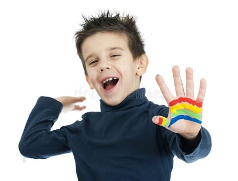 Mani Del Ragazzo Dipinte Con Pittura Variopinta Immagine Stock