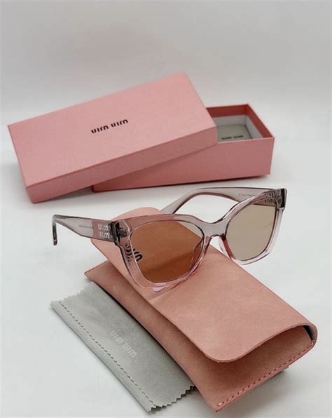 Miu Miu Очки солнцезащитные купить с доставкой по выгодным ценам в