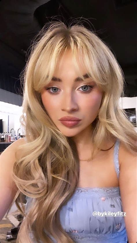 How Do Sabrina Carpenters Bangs Literally Not Move While She Performs