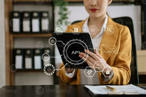 api application programming interface woman using laptop tablet and