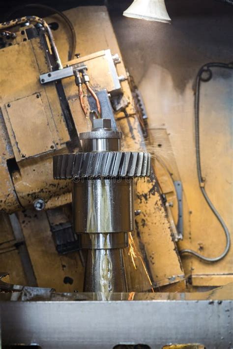 Old Machine Processes A Large Metal Part Cutting And Cooling Of The
