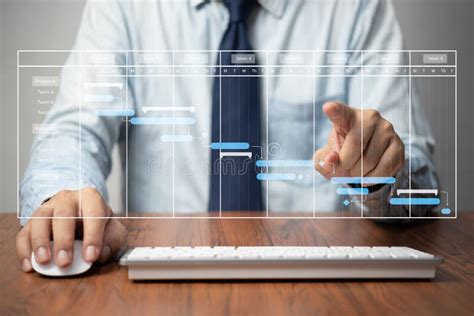 Project Manager Analyst Working With Computer In Management System To Progress Planning And Make