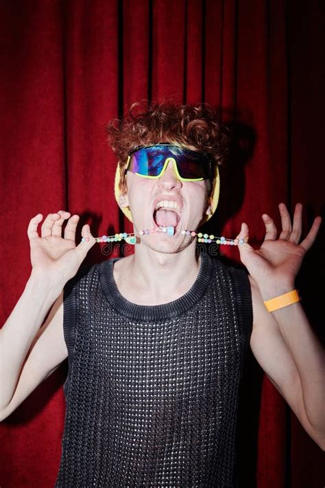 Young Excited Man Holding Neck Accessory Stock Image Image Of Young Emotion 330376435