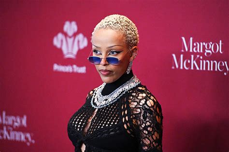 Doja Cat Debuts Dramatic Purple Hair Transformation With Intricate