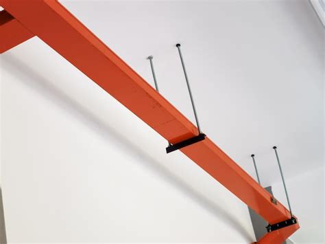 Premium Photo Over Head Orange Color Cable Tray Or Trunking Mount On