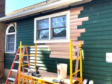 Patching The Cedar Siding Where The Old Window Was