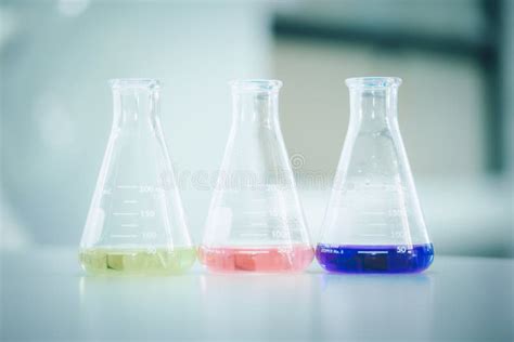 Laboratory Flask With Colorful Liquids Stirred Inside In Laboratory Stock Image Image Of Flask