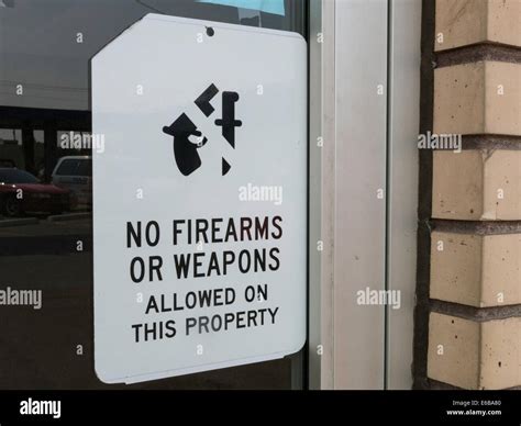 No Firearms Or Weapons Allowed On This Property Sign In Montana Usa