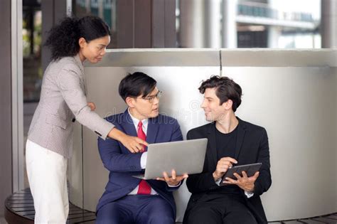 A Diverse Team Of Professionals Collaborating On A Business Project