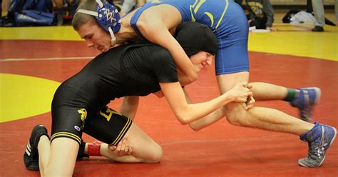 Men Wrestling Women Cradle Him Up