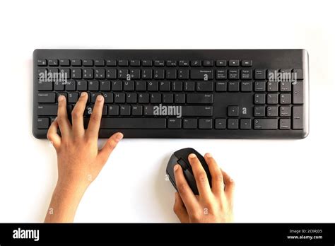 Black Wireless Keyboard And Mouse Isolated On White Background Peron Tying And Holding Mouse In