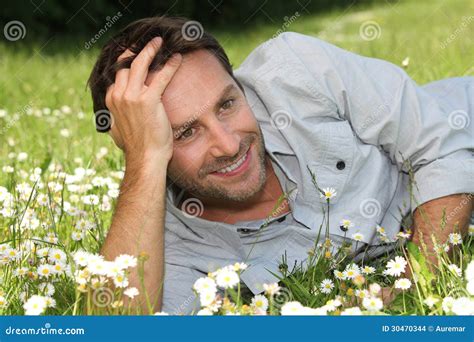 Man Lying On Grass Stock Photo Image Of Grass Smiling