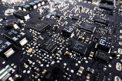 Close Up Of Electronic Circuit Board With Processor Fragment Of The