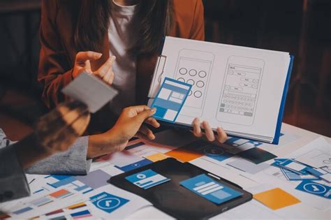 Premium Photo Team Of Ui Ux Web Designer Are Working Together To