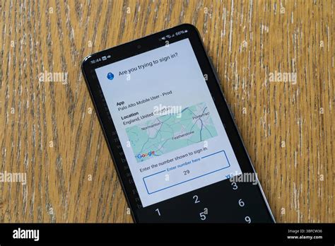 Android Smartphone With The Microsoft Authenticator App Showing A Number To Input On A Work