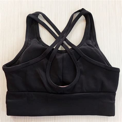 ست ورزشی زنانه نیم تنه شورتک مشکی نایک