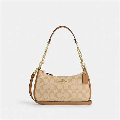 Teri Shoulder Bag In Signature Canvas Is A Stylish And Practical