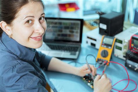 Woman Soldering A Printed Circuit Board Stock Image F013 2063 Science Photo Library