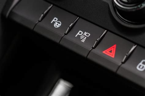 Premium Photo Hand Operating Esp Electronic Stability Program Control Close Up View