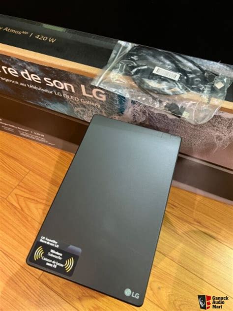 LG GX Meridian Dolby Atmos Soundbar Wireless Sub Photo Canuck Audio Mart
