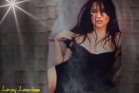 Download Lucy Lawless Sexy In Black Wallpaper