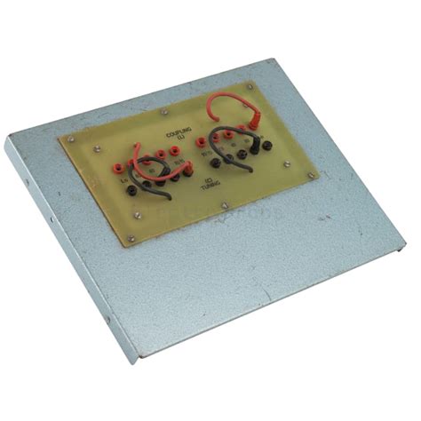 Small Patch Panel With Red And Black Plugs Sockets And Wires On Hammerite