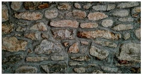 Operational Modal Analysis And Non Linear Dynamic Simulations Of A Prototype Low Rise Masonry