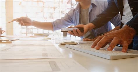 programer team working development software with ux ui project on table photo ux research