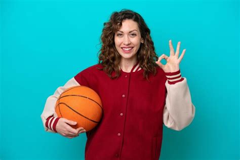 Premium Photo Young Caucasian Basketball Player Woman Isolated On
