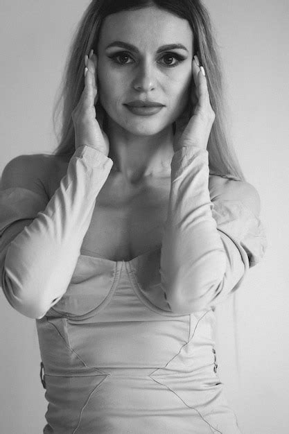 Premium Photo Sexy Young Woman Girl Posing On Wall In Studio