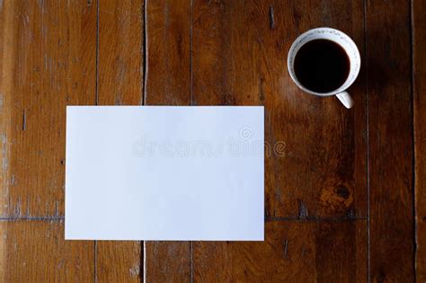 A4 Mockup Top View With Cup Of Coffee On Wooden Table Vertical