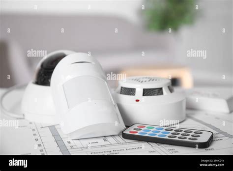 Cctv Camera Remote Control Smoke And Movement Detectors On Building Plan Indoors Home