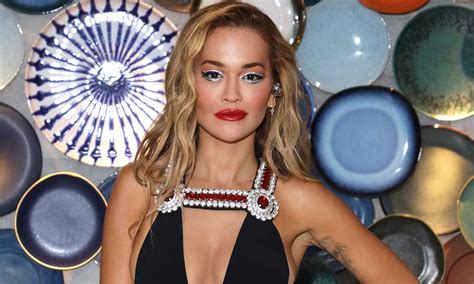 Rita Ora Wears A Silver Underboob Dress In Zurich