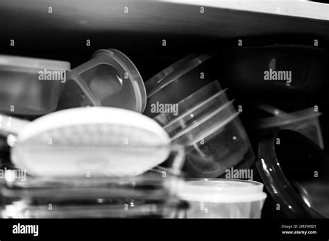 Narrow Depth Of Field Picture Of An Open Kitchen Cabinet With An