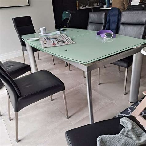 Freelywheely Extendable White Glass Dining Table