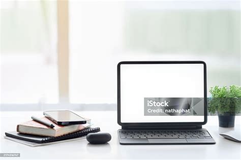 Digital Taplet With Keyboard Mock Up Blank White Screen On The Table