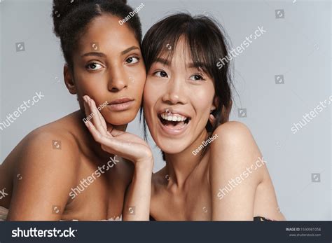 Portrait Two Multinational Halfnaked Women Posing ภาพสต็อก 1590981058