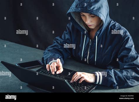 Hacker Teen Programmer Uses A Laptop To Hack The System Stealing