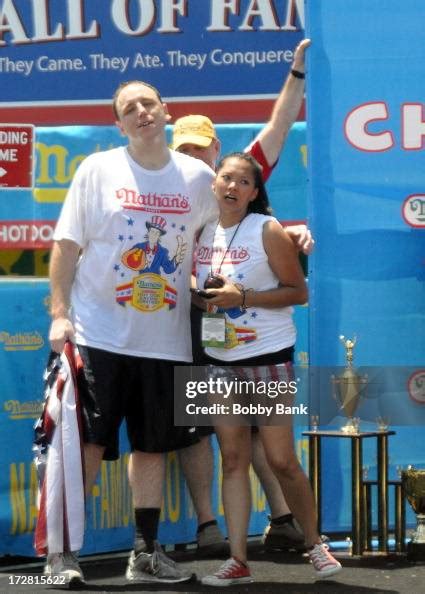 Joey Chestnut And Girlfriend Neslie Ricasa At The 2013 Nathans News