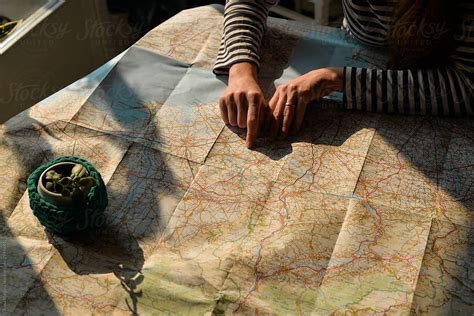 A Woman Planning A Journey With A Map By Stocksy Contributor Anna Malgina Stocksy