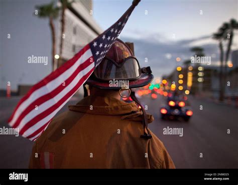 Las Vegas Firefighter Capt Eric Littmann Walks In A Parade Commemorating The 2001 Attacks On