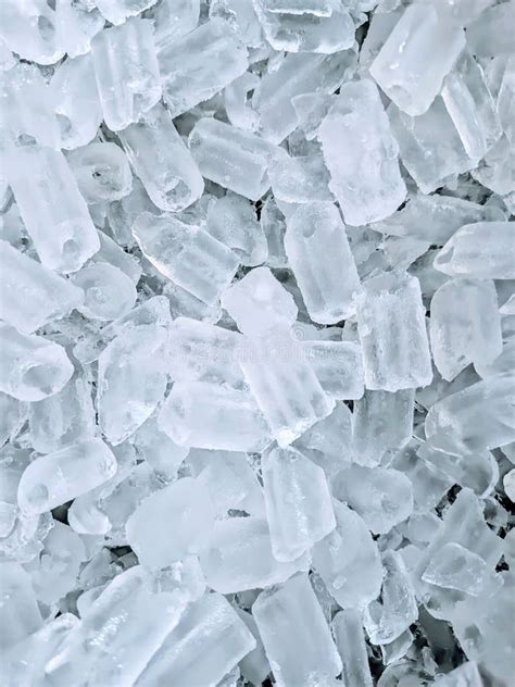 Close Up Of Cylindrical Ice Cubes For Refreshing Cold Drinks Stock